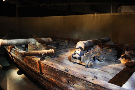 Armed with three cannons and eight swivel guns, The USS Philadelphia is ...