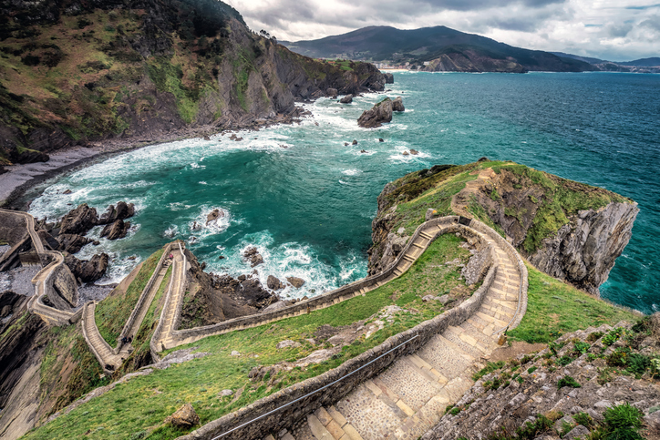 An island off northern Spain with a small church perched on top is the ...