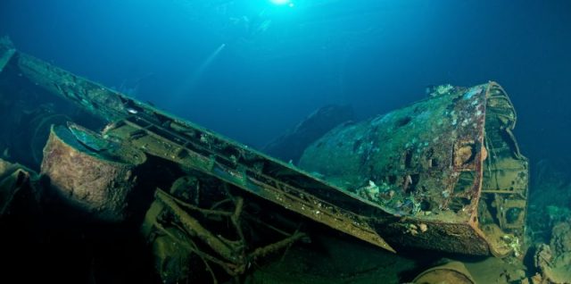 An eerie WWII underwater graveyard of ships still holds the remains of ...