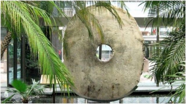 The Rai Stones are huge stone wheels used as currency on the island of ...
